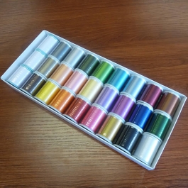 Janome embroidery threads box of 27 different spools great value