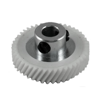 Sewing Machine Gears and cogs to drive internal parts in a sewing machine