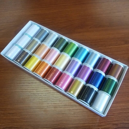 Janome embroidery threads box of 27 different spools great value